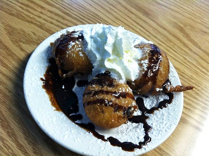 Fried Oreos topped with whipped cream – because sometimes you need dessert disguised as more dessert.