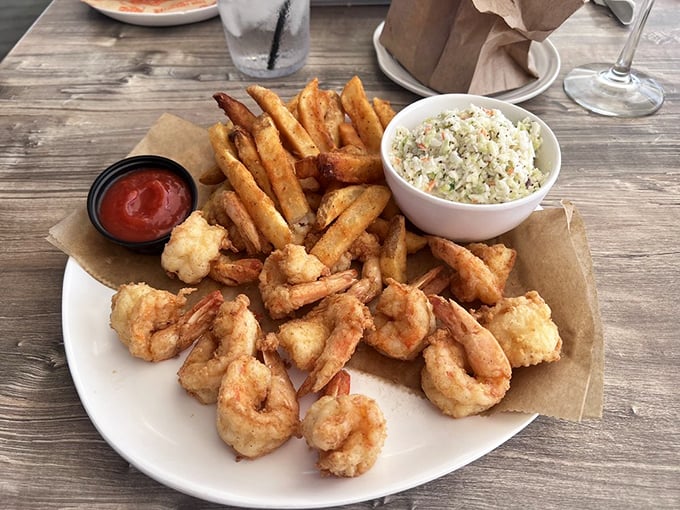 Golden fried shrimp lined up like delicious soldiers, ready to march straight into your happy place.