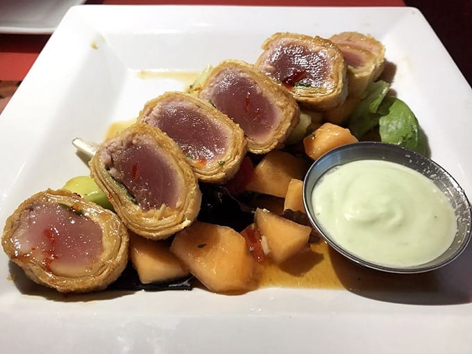 The Tuna Basil Roll—seared perfection wrapped in crispy goodness. Rare in the center, like finding humility in Hollywood.