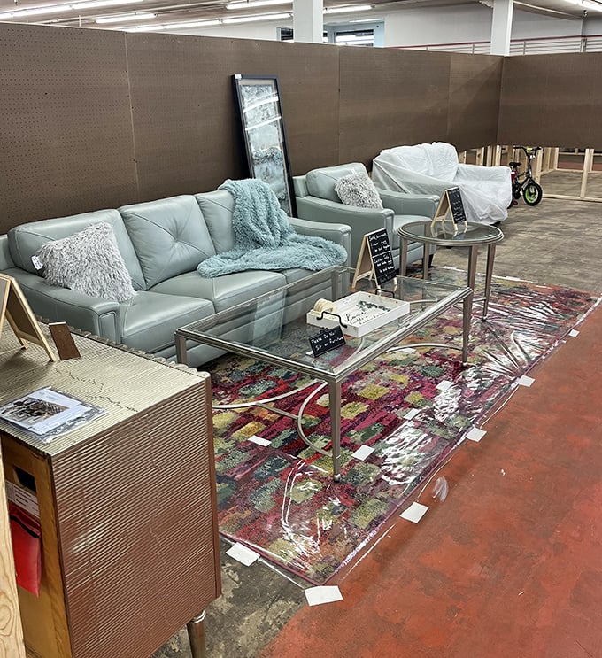 Mid-century meets modern comfort in this stylish living room setup. That glass coffee table has probably seen fewer rings than the one currently in your den.