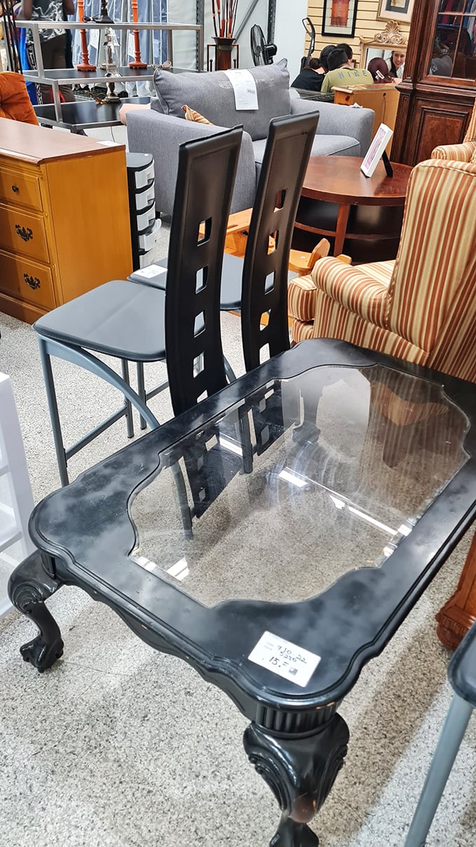 Not just furniture—time machines. That black coffee table has probably seen more dinner parties than most caterers in Miami.