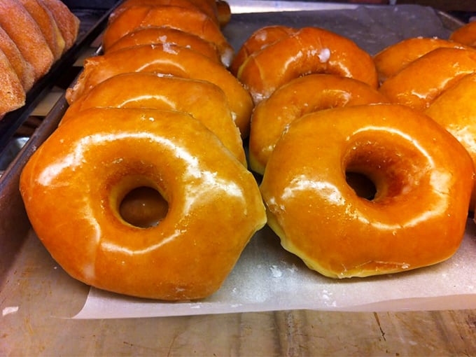 These glazed donuts aren't trying to impress anyone with fancy toppings – they're too busy being perfect at what matters.