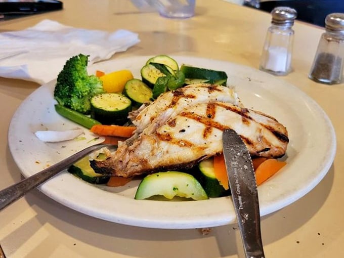 Simple perfection on a plate – this grilled fish with fresh vegetables proves that sometimes less truly is more.