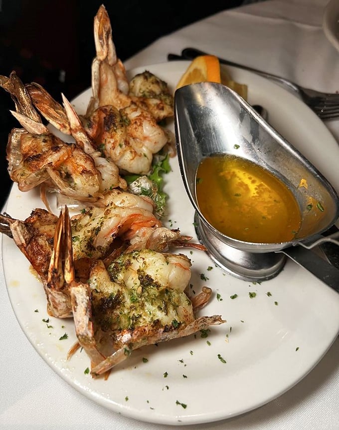 These prawns aren't just grilled—they're transformed into oceanic ambassadors of flavor, complete with their diplomatic pouch of butter sauce.