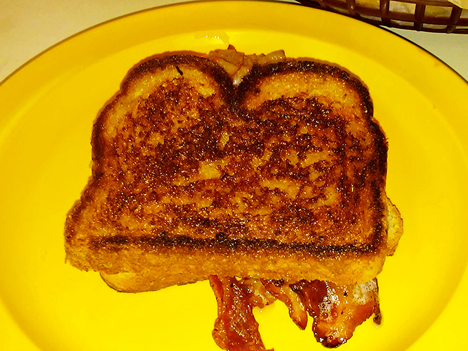 This isn't just grilled cheese—it's a toasty love letter to simplicity with bacon playing the charming supporting role it was born to play.