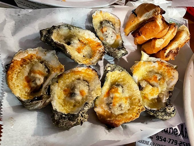 Grilled oysters that make you wonder why anyone would eat them any other way—cheesy, savory ocean jewels.