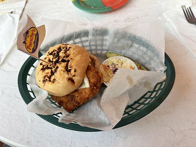 The legendary grouper sandwich—where the fish hangs over the bun like Florida real estate hanging over your budget, but infinitely more satisfying.