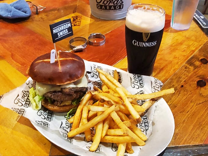 Burger bliss achieved! A perfectly grilled patty nestled on a branded bun with golden fries—the automotive theme extends right to your taste buds.