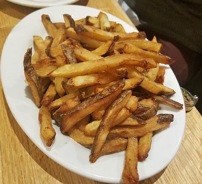 Fries that actually taste like potatoes—what a concept! These hand-cut beauties make the frozen variety seem like a sad culinary compromise.
