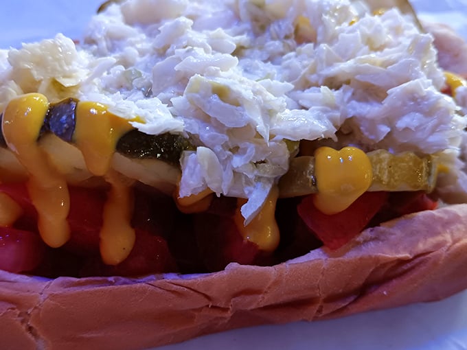 This isn't just a hot dog—it's a canvas of comfort topped with a symphony of toppings and a drizzle of mustard magic.