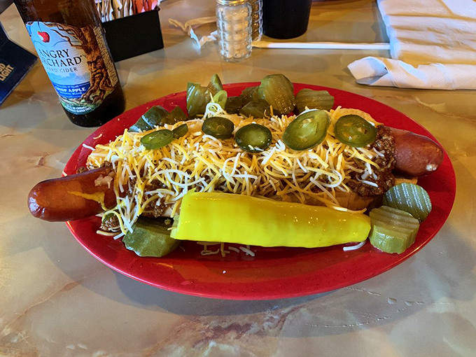 Not just any hot dog—a Hungarian hot dog topped with chili, cheese, and pickles. This is what hot dogs dream of becoming when they grow up.