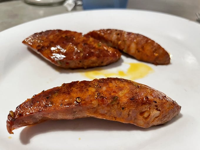 These Hungarian sausages aren't just browned—they're caramelized to perfection, glistening with juices that demand to be sopped up with toast.