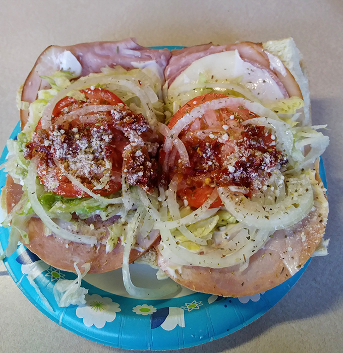 Layer upon layer of Italian goodness. This isn't just a sandwich—it's architecture with ingredients that would make any nonna nod in approval.