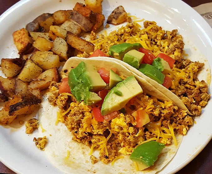 Breakfast tacos that put ordinary morning meals to shame. Those cajun home fries on the side aren't just potatoes—they're little cubes of perfectly seasoned happiness.