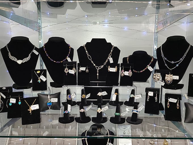 A jewelry display that would make Elizabeth Taylor pause mid-sentence. Those necklaces aren't just accessories—they're wearable time machines to more glamorous eras.