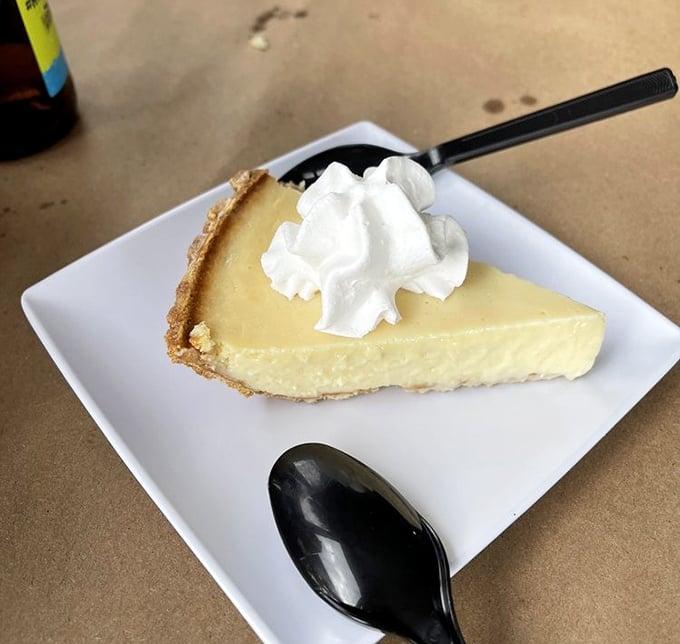 Key Lime pie that hits that perfect sweet-tart balance. The whipped cream isn't just a garnish—it's essential diplomatic relations between sweet and sour.