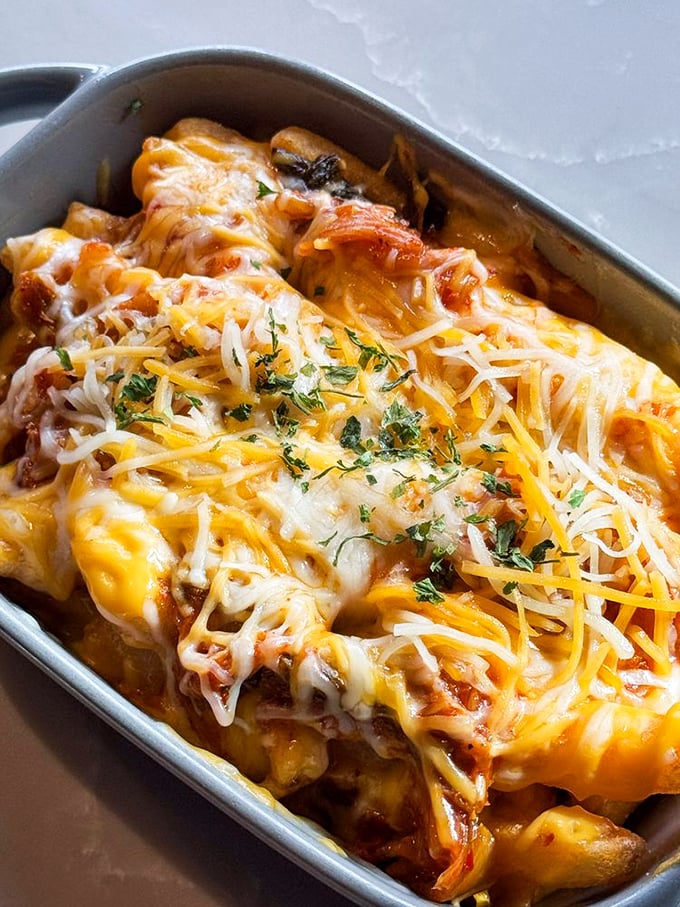 Kimchi cheese fries – where East meets Midwest in a bubbling cauldron of cultural fusion that your taste buds never knew they needed.