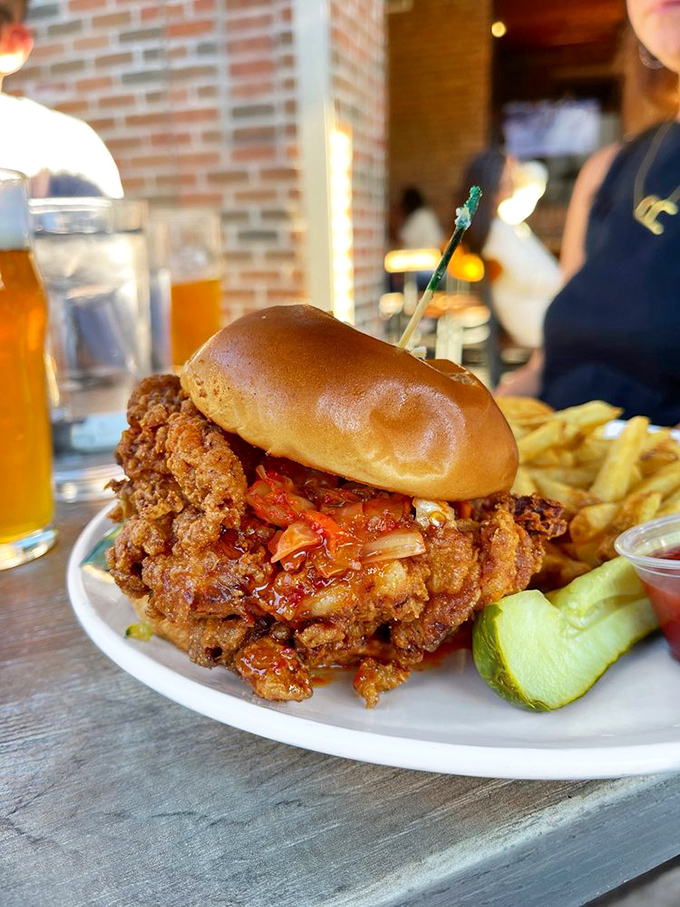 This Korean-style fried chicken sandwich towers like a delicious skyscraper, demanding your immediate attention and appetite.