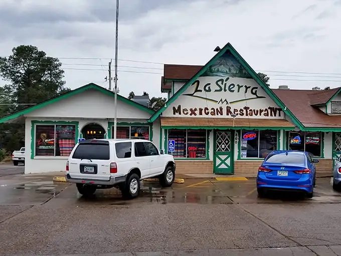 La Sierra's bright green trim promises Mexican food that doesn't apologize for its authenticity—the kind of place where chips and salsa disappear before you've ordered.