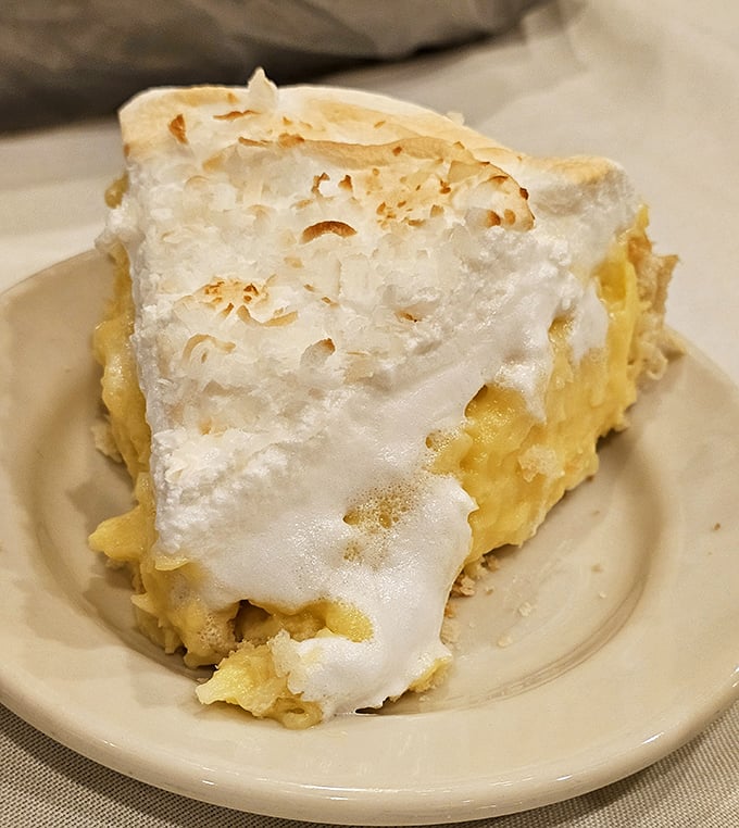 This lemon meringue pie doesn’t just have meringue—it has a cloud formation that meteorologists would study with fascination and hunger.