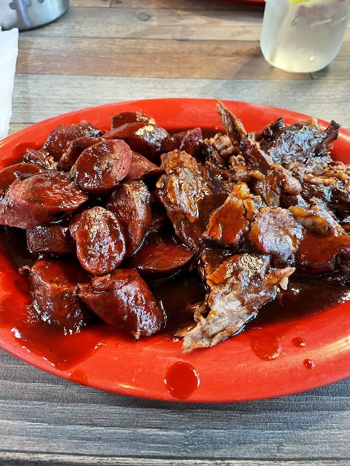 Links and brisket sharing a plate like old friends at a reunion. The sauce isn't just a condiment—it's part of the conversation.