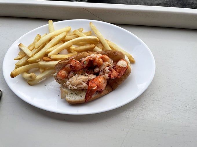 The lobster roll – where sweet, tender chunks of Maine's finest meet buttery, toasted perfection. A sandwich worth crossing state lines for.