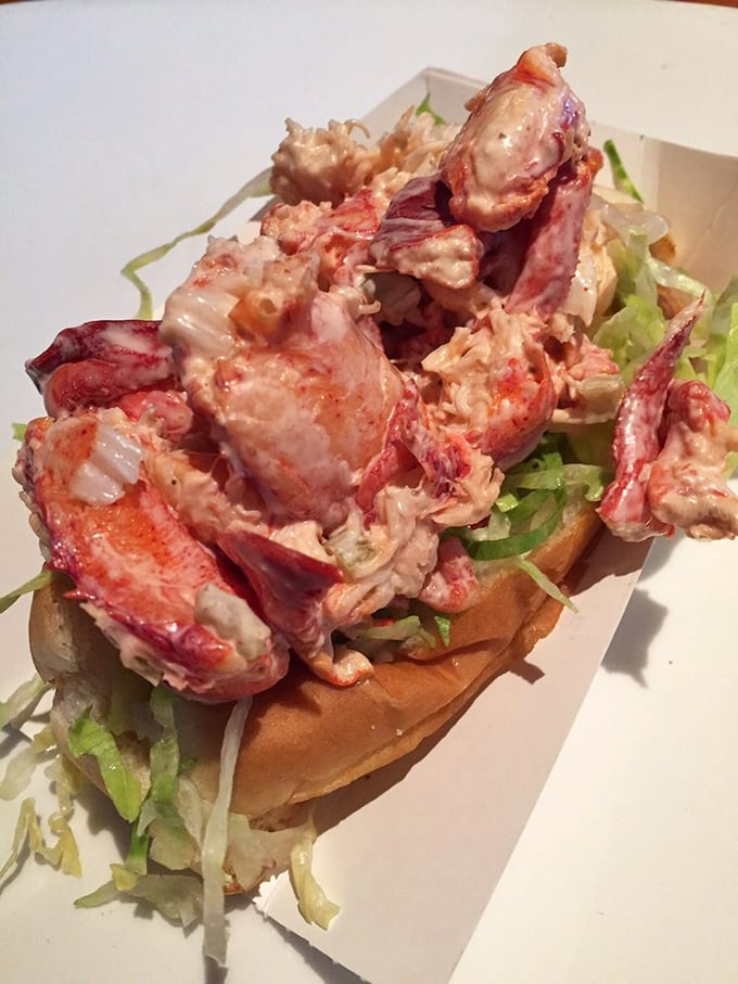 Lobster roll perfection: chunks of sweet meat nestled in a buttery vessel. The ocean called—it wants to know why its lobster tastes better here. 