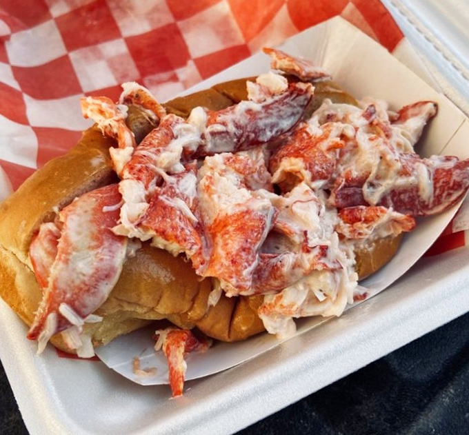 This isn't just a lobster roll—it's a celebration on a bun. Sweet, tender chunks of Maine's finest treasure, barely held together by the perfect amount of mayo.