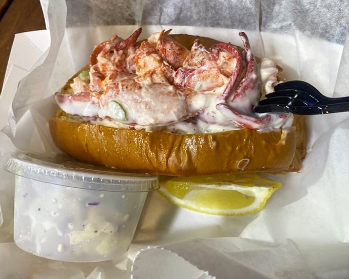 The lobster roll that launched a thousand road trips—chunks of sweet Maine lobster practically spilling over the sides of a perfectly toasted bun.