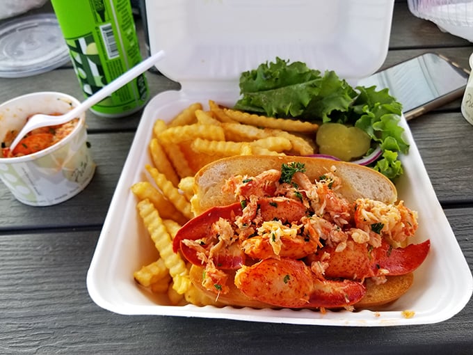 This lobster roll doesn't need fancy presentation—the overflowing meat speaks for itself. Vacation on a bun, no passport required.