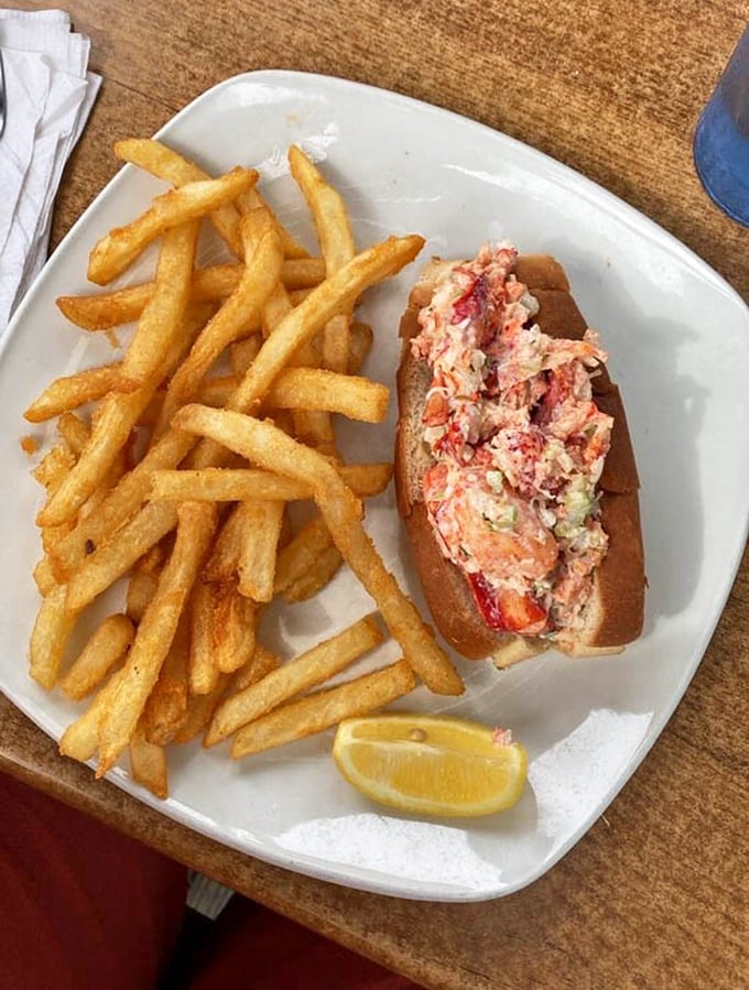 The lobster roll – where Maine tradition meets Carolina hospitality, with fries that deserve their own fan club.