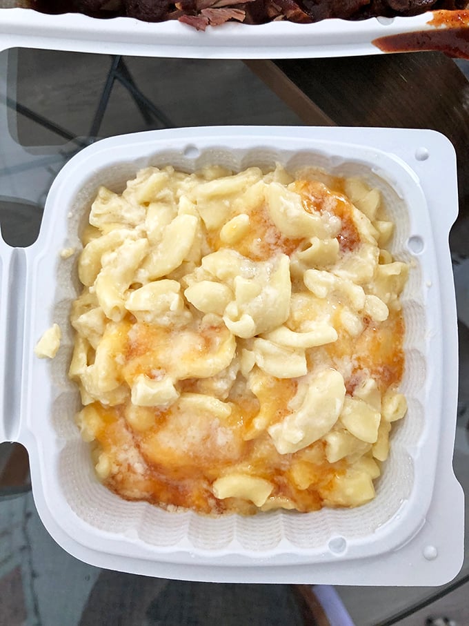 Mac and cheese that doesn't apologize for being exactly what it is – comfort in a container, with cheese pulling rank over any pretentious additions.