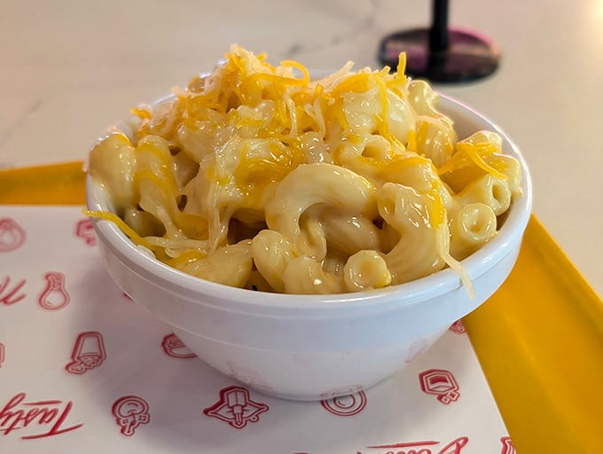 Mac and cheese so gloriously gooey it should come with a warning label: "May cause involuntary food moans in public places."
