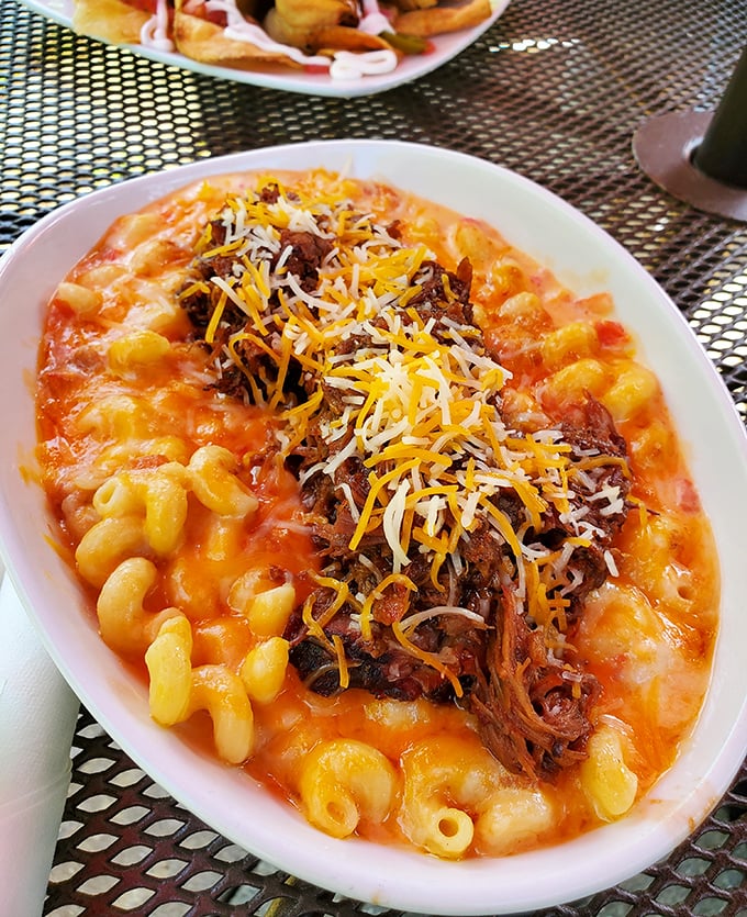 Mac and cheese gets the royal treatment with a crown of pulled pork – comfort food having a fancy night out.