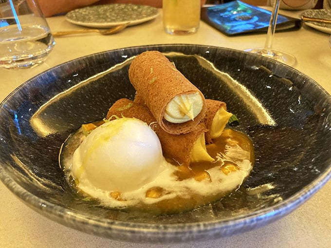 Dessert that makes you question your life choices—why haven't you been eating this all along? Crispy exterior, creamy interior, and that perfect scoop of ice cream.