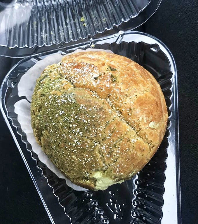 Half matcha, half vanilla – this cream puff doesn't believe in choosing sides when both flavors can coexist in perfect harmony.
