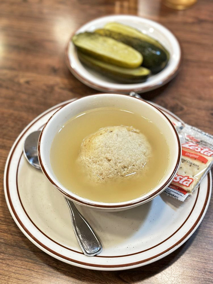 The matzo ball soup at Canter's—where penicillin meets poetry. That golden orb floating in clear broth has cured more ailments than modern medicine.