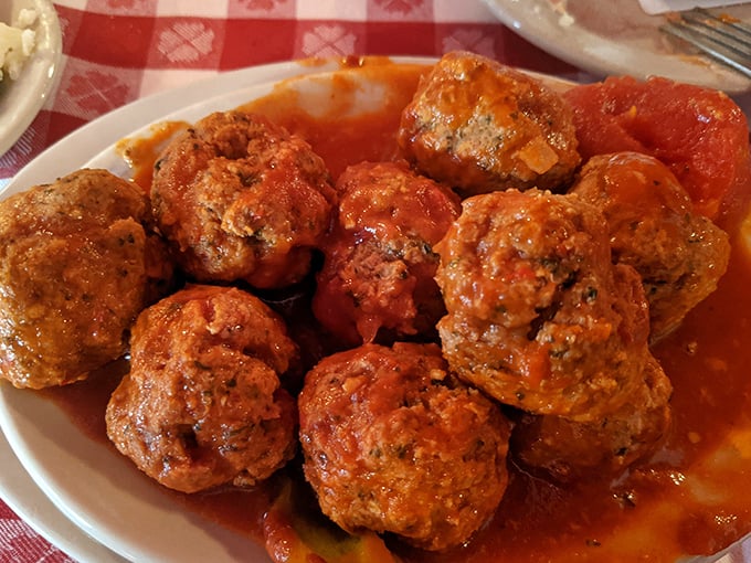 "Meatballs Bucharest" swimming in spicy tomato sauce—like little flavor bombs waiting to detonate on your taste buds.