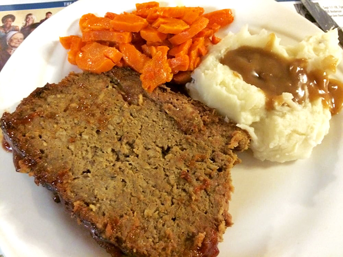 Meatloaf that would make your grandmother both proud and jealous, flanked by mashed potatoes standing by for gravy duty.
