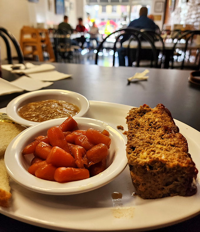 Comfort food doesn't get more authentic than this—homestyle meatloaf with candied carrots that could make your grandmother jealous.