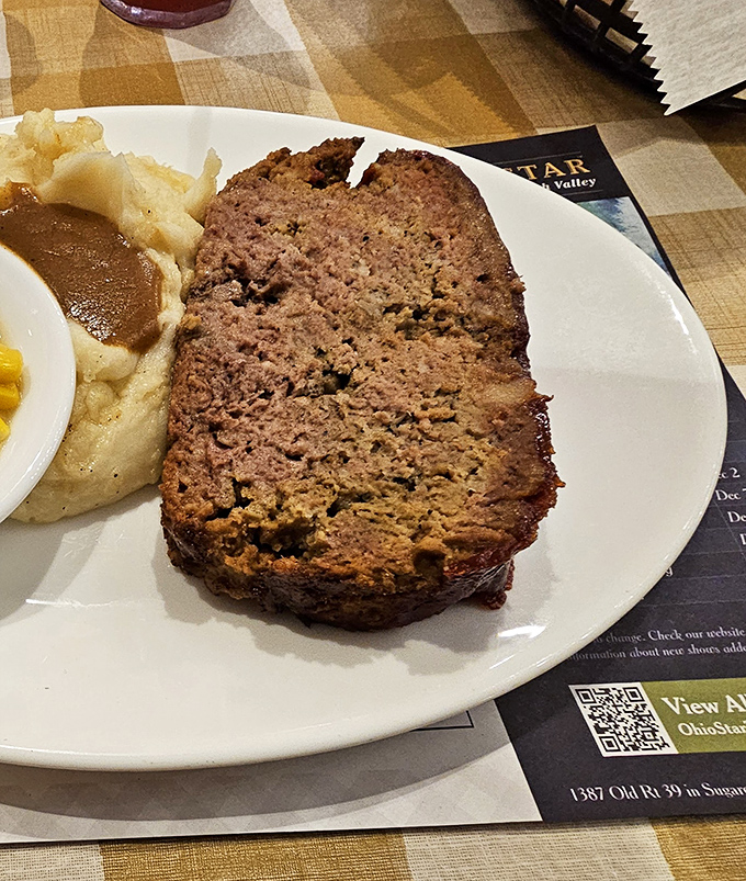 Meatloaf so tender it practically surrenders to your fork. This isn't just comfort food—it's emotional support on a plate.