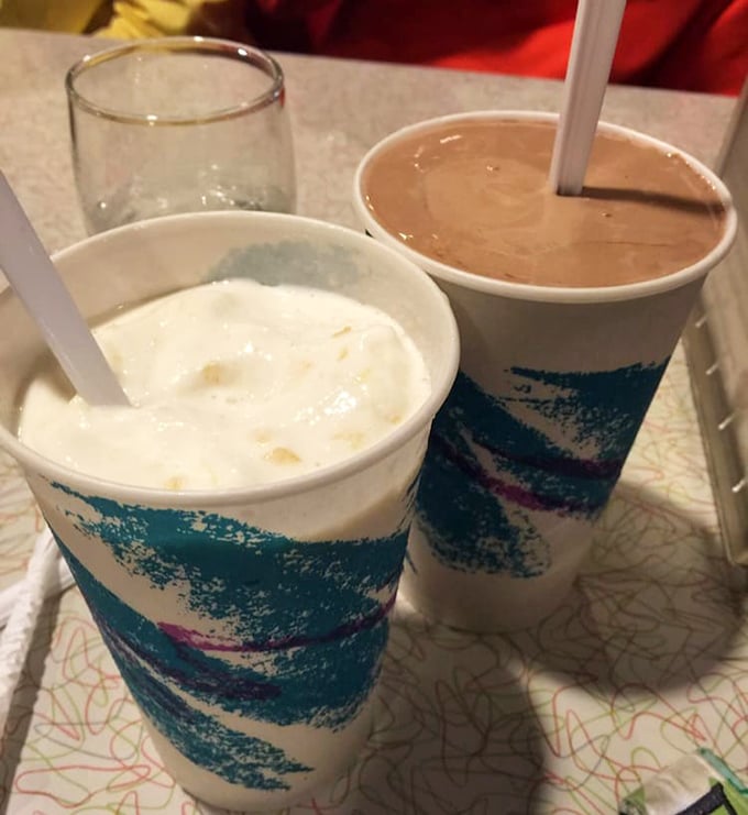 Thick, hand-spun milkshakes in vintage cups – one vanilla, one chocolate – waiting to transport you back to simpler, sweeter times.
