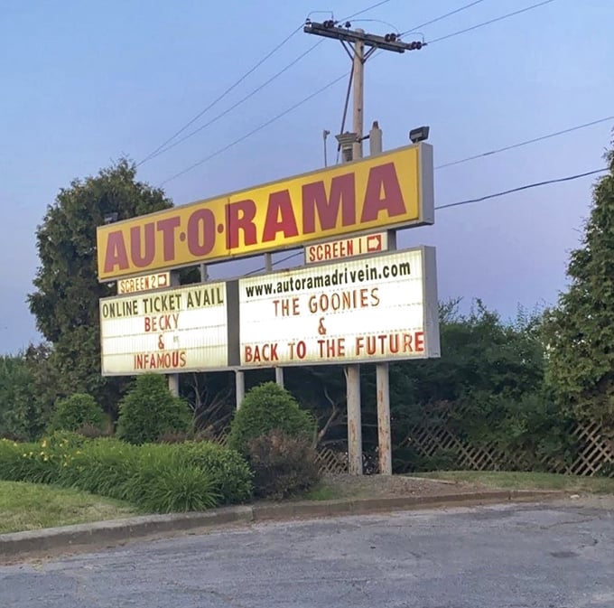 That iconic yellow marquee announces tonight's double feature—"The Goonies" and "Back to the Future"—a time-traveling experience in more ways than one.