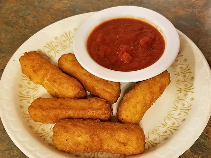 Golden-fried mozzarella sticks with marinara—the universal language of "yes, you deserve this today" spoken fluently at Coney Island Inn.