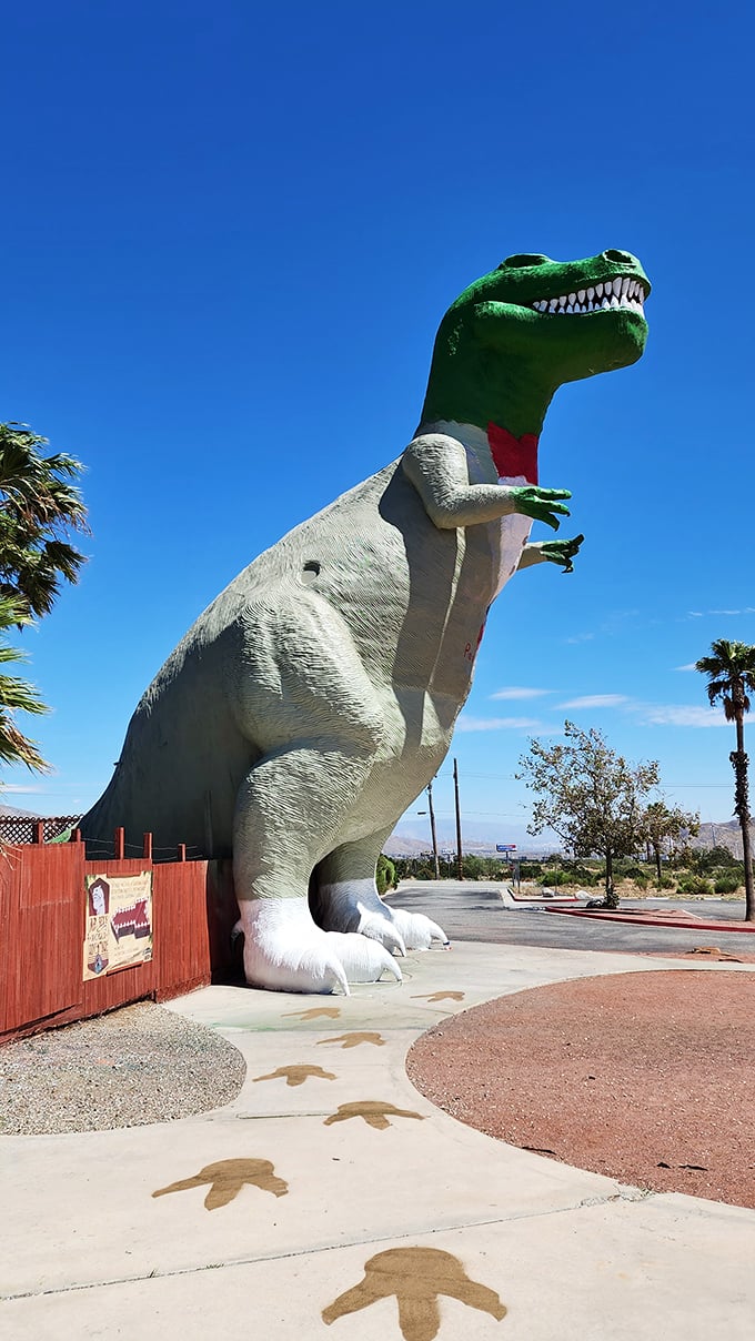 Footprints embedded in the concrete lead visitors toward the towering T-Rex – follow them if you dare, or if you need the perfect vacation selfie.