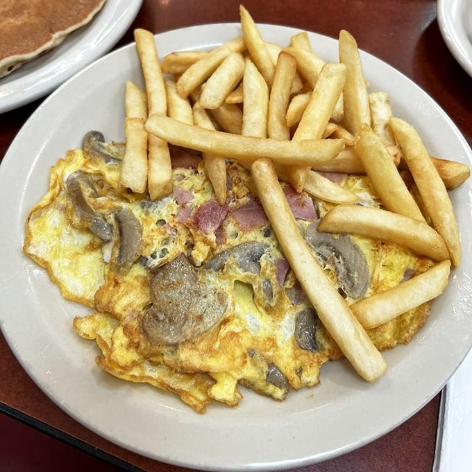 An omelet that doesn't need to show off—it just delivers. Those mushrooms didn't sacrifice themselves in vain.