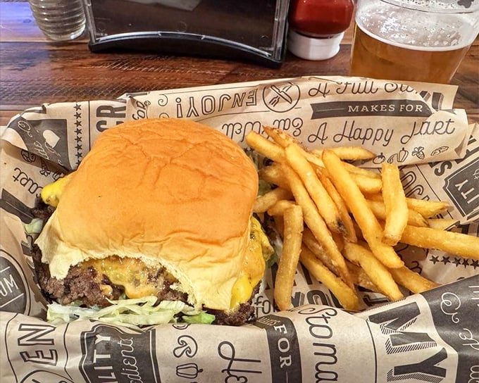 The classic cheeseburger and fries combo—proof that sometimes the simplest pleasures in life are also the most satisfying.