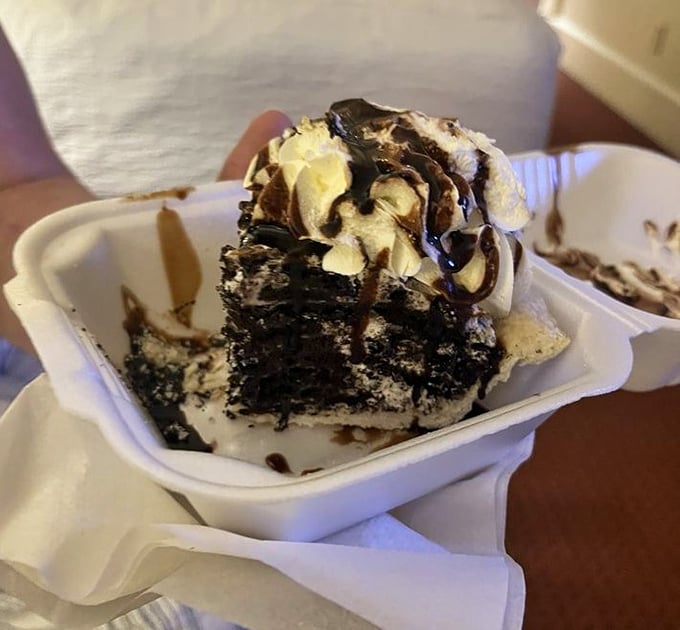 Chocolate paradise in a foam container—this Oreo pie doesn't care about being photogenic because it's too busy being absolutely delicious.