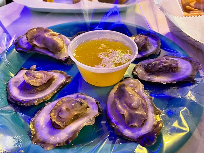 Fresh oysters on the half shell gleaming like ocean jewels, ready for their starring moment.