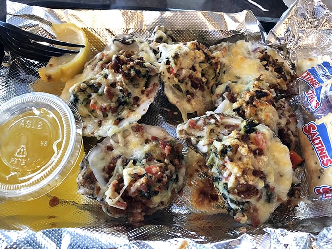 These oysters Rockefeller aren't just topped—they're crowned. Bubbling cheese and savory toppings transform these bivalves into maritime royalty.